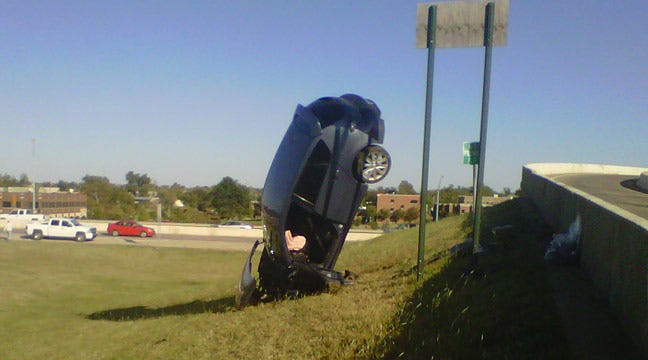 Car Nose Dives Into Ground Off Tulsa's IDL