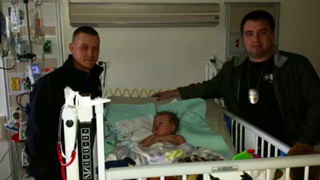 Wagoner County Officers, Heroes Rescue Baby Trapped In Overturned Truck