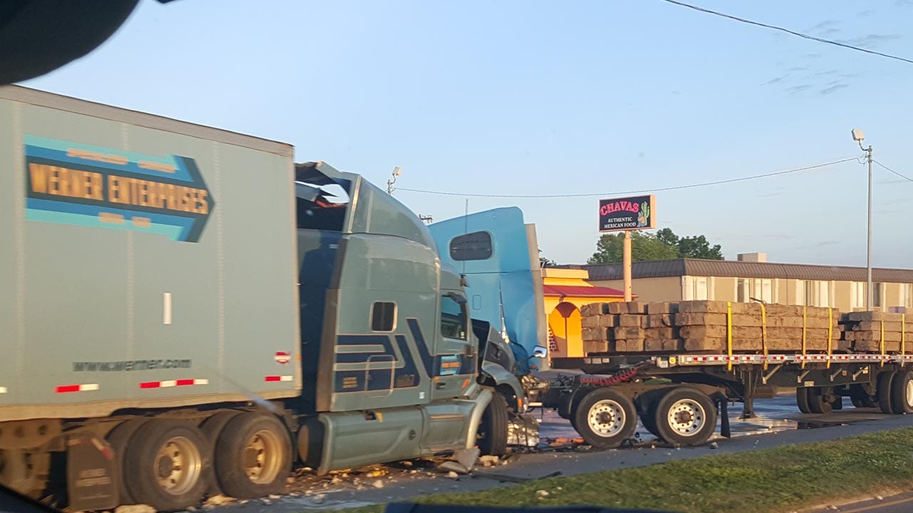 1 Person Dead After 2 Semis Crash Head On, Smash Car Between Them