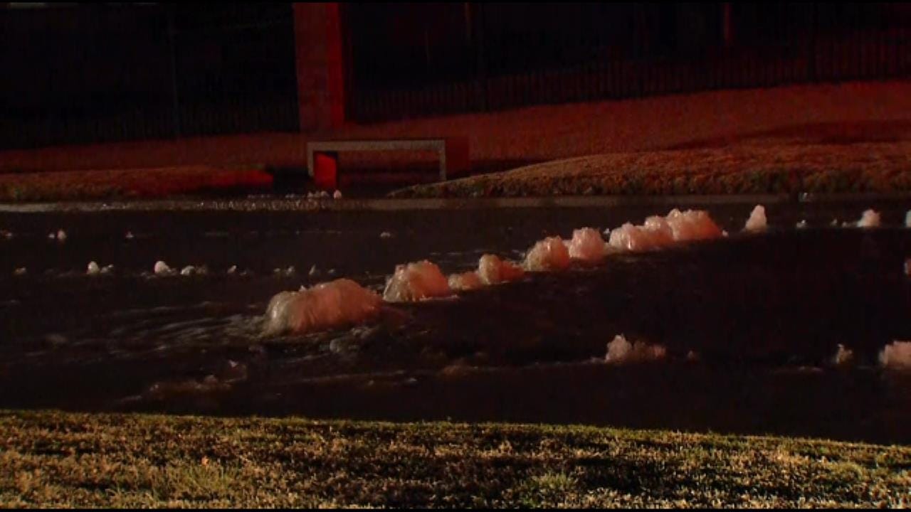 Water Bubbles Up From Tulsa Street During Freezing Friday Night