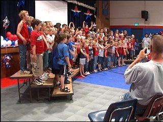 Coach trades classroom for combat