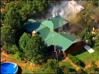 Firefighters Battle Log Cabin Fire Near Lake Stanley Draper