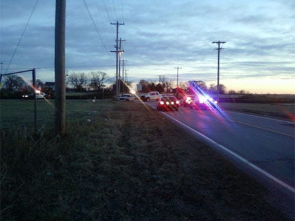 Woman Runs Stop Sign, Crashes into Police Officer's Vehicle