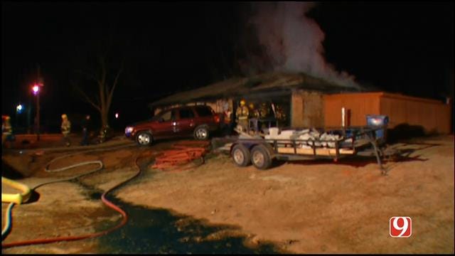 Fire Crews Douse House Fire In Mustang