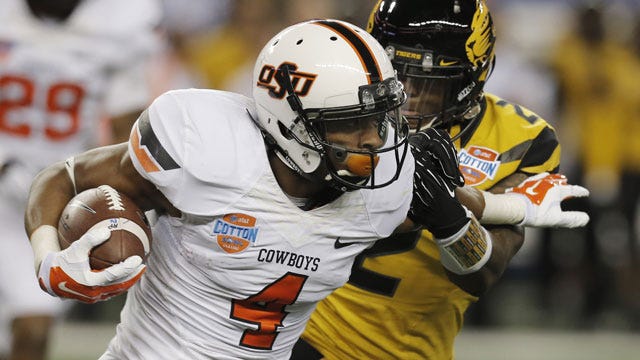 Gilbert Gets College Football Performance Award