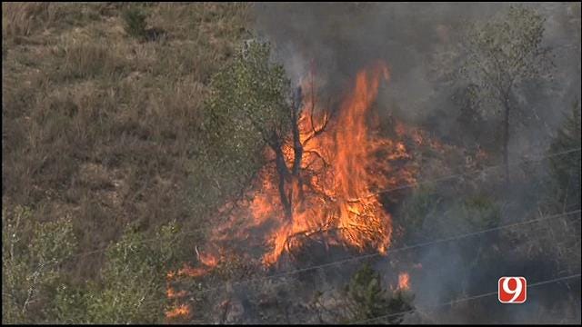 Downed Power Lines Spark Grass Fire In Norman