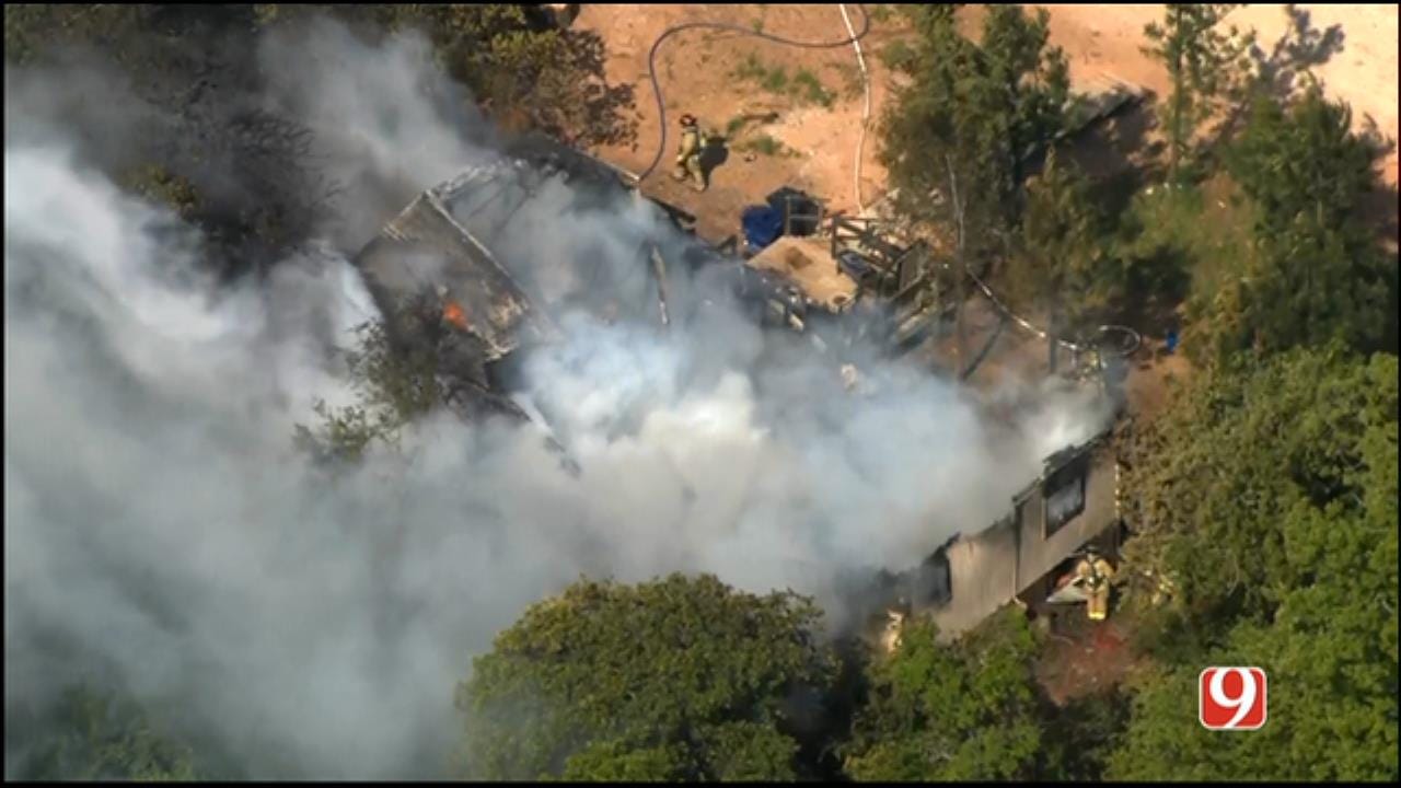 Firefighters At Scene Of Norman House Fire