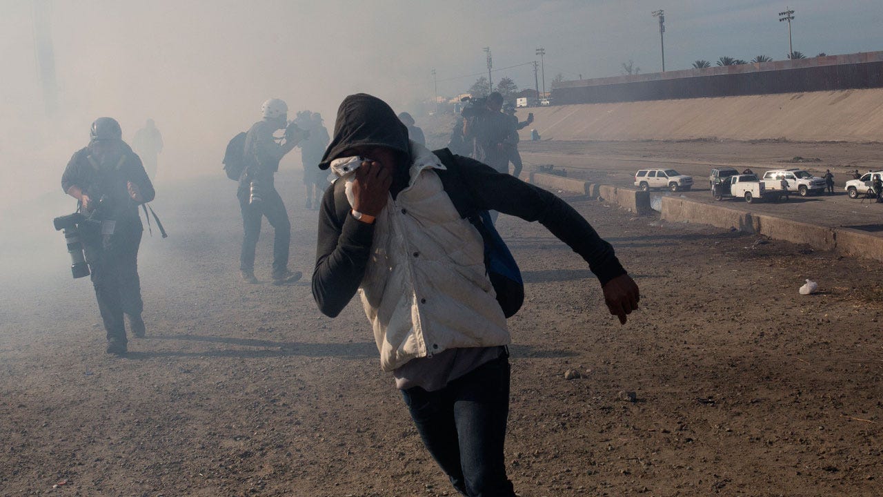 U.S. Agents Use Tear Gas As Some Migrants Try To Breach U.S.-Mexico Border